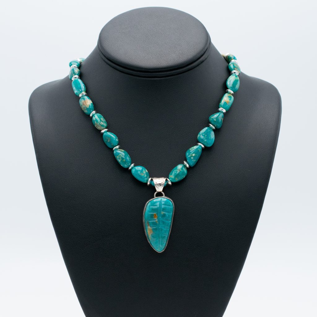 Carved Turquoise Feather Necklace | Silver Sun