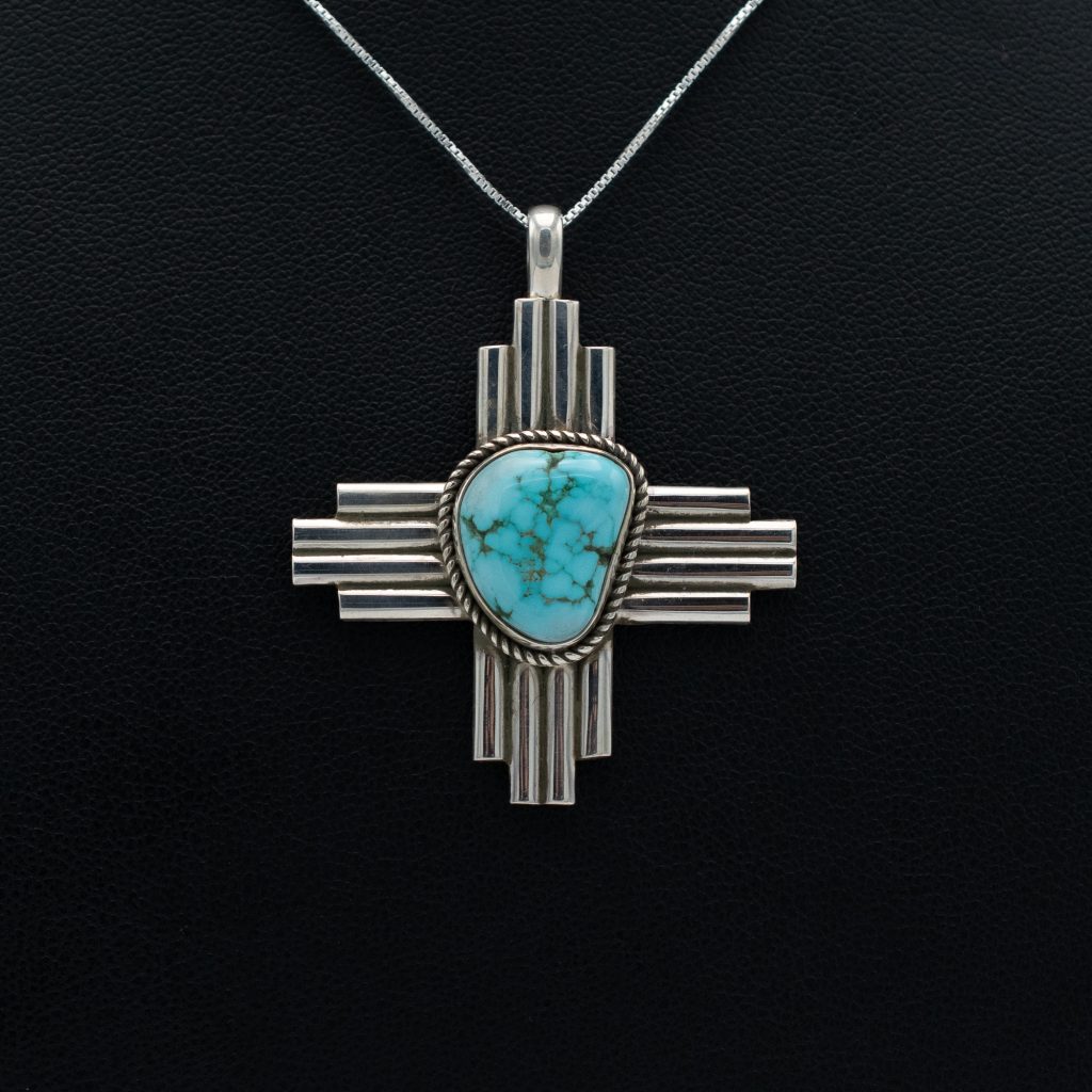 Lone Mountain Turquoise Zia Pendant | Silver Sun